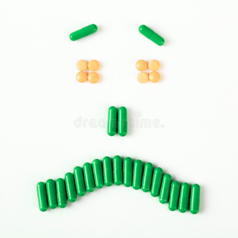 Sad and Crying Smile Made from Many Pills Capsules. Wellness Concept ...