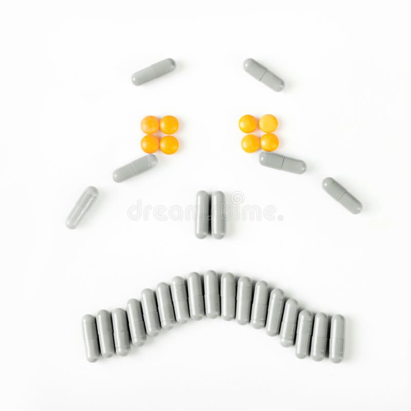Sad and Crying Smile Made from Many Pills Capsules. Wellness Concept ...