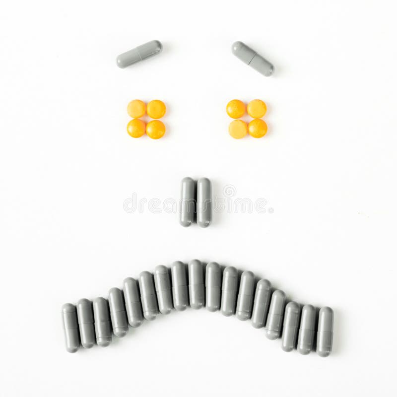 Sad and Crying Smile Made from Many Pills Capsules. Wellness Concept ...