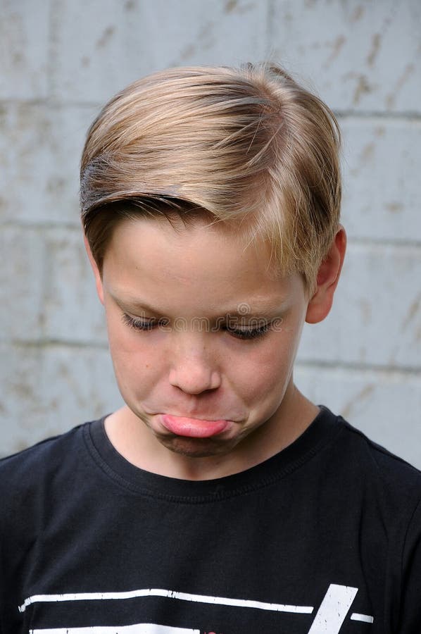Offended Moping Blond Boy Pulls a Face Stock Image - Image of ...