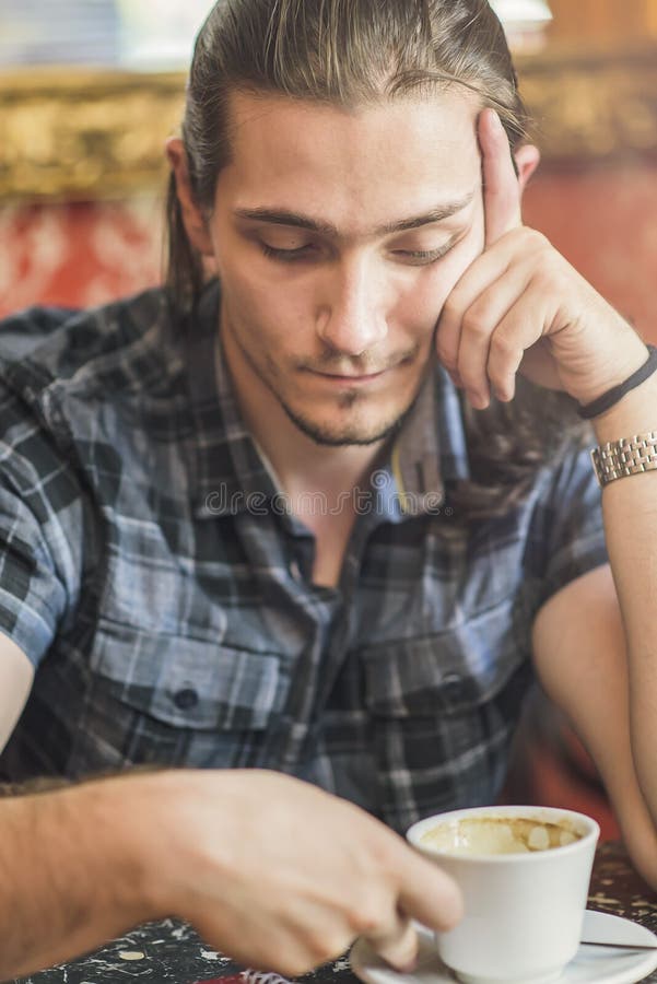 Depressed Young Man in a Coffee Shop Stock Image - Image of emotion ...