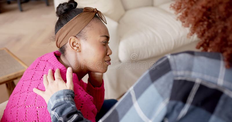 Sad Diverse Couple Sitting on Sofa, Comforting and Embracing, Slow ...