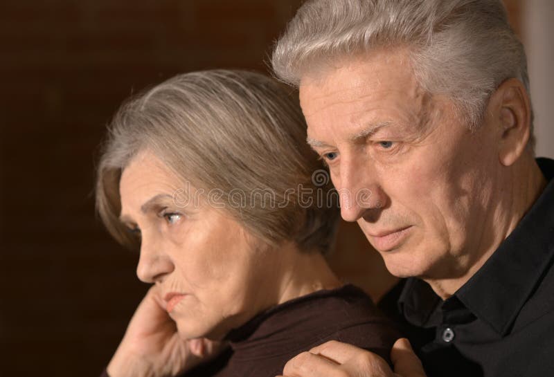 Sad elder couple at home stock image. Image of human - 54843989