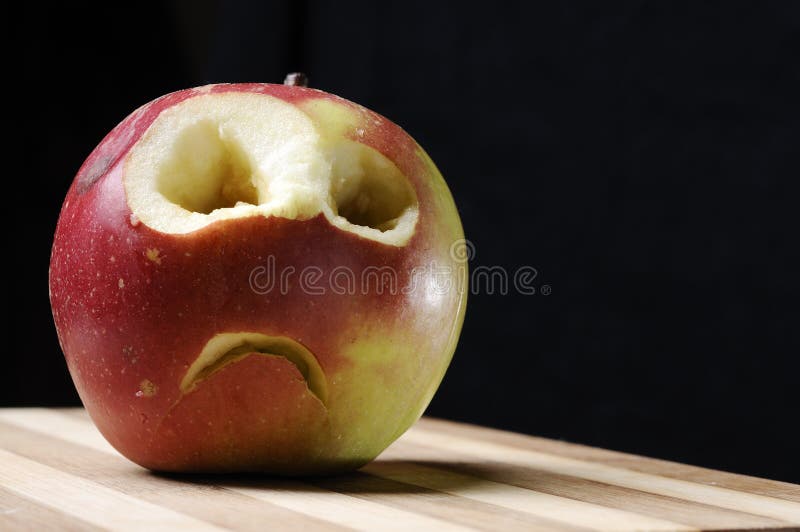 Sad Faced Apple on Wood Board Stock Image - Image of depression ...