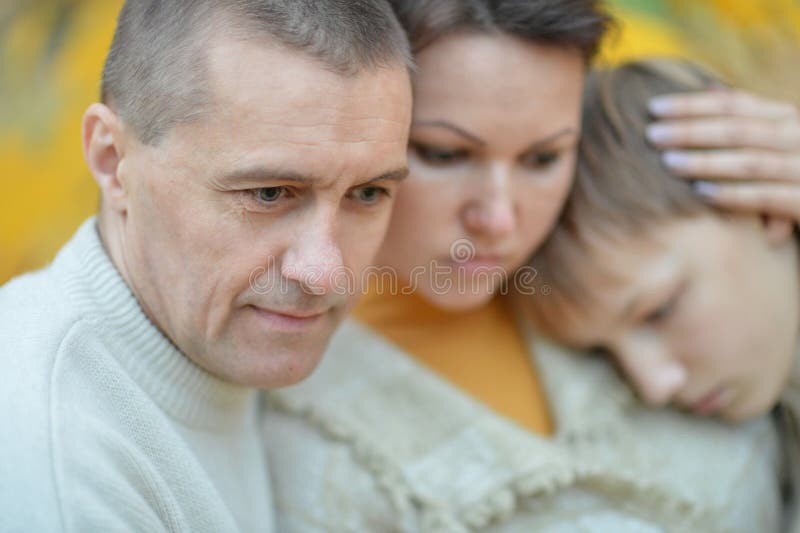 Sad Family Of Three On The Nature Stock Image - Image of couple ...