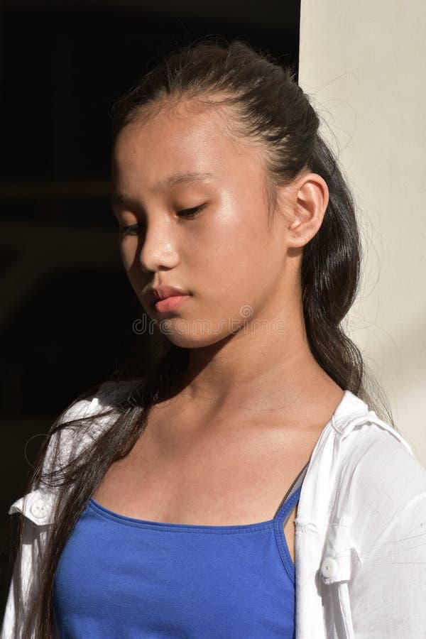 A Sad Filipina Person stock image. Image of solemn, asian - 137639435
