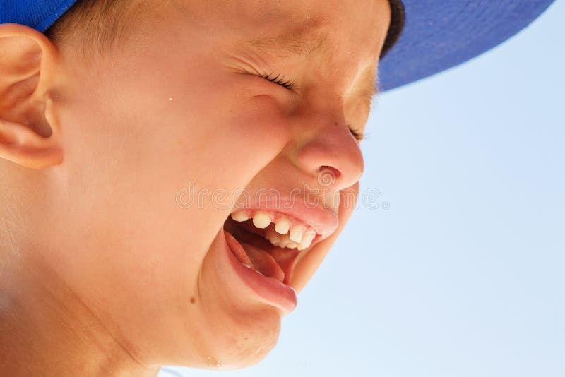 Little Five-year-old Boy in a Blue Cap Crying Stock Photo - Image of ...