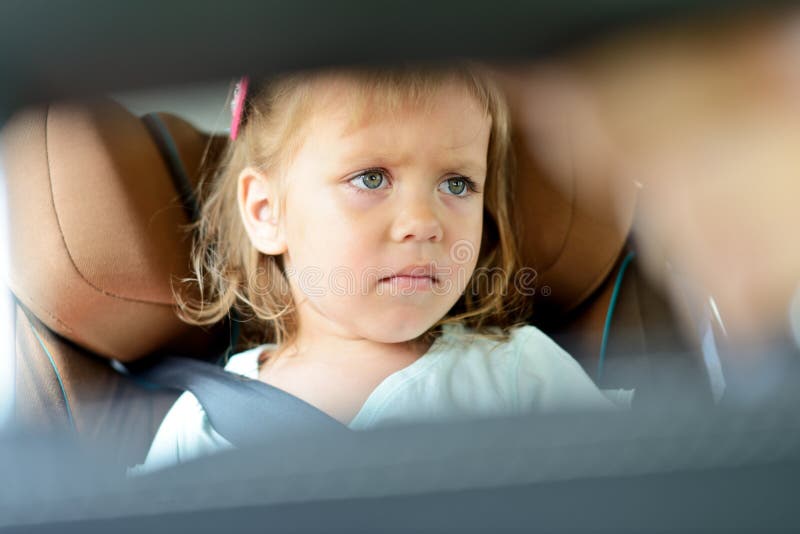Sad girl in car stock image. Image of buckle, carchair - 51983009