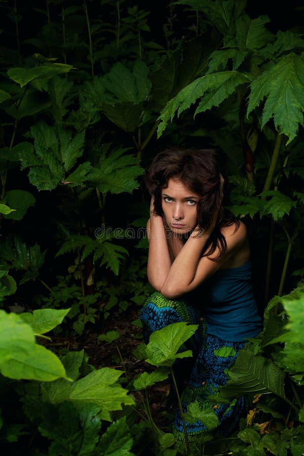 Sad Girl Lost in Dark Forest Stock Image - Image of leaves, dark: 29204275