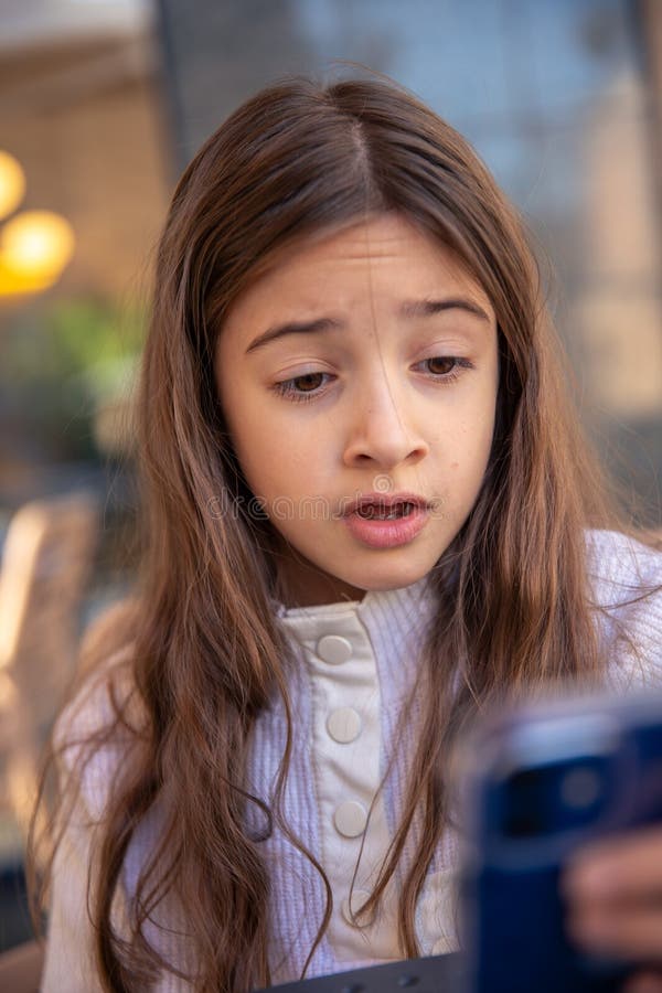 Sad Girl with a Phone. Sad Girl Using Mobile Phone Stock Image - Image ...