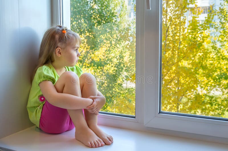 Sad girl in the window stock image. Image of beautiful - 26806499