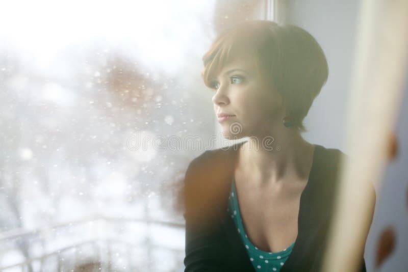 Sad Girl on Windowsill Looking Out the Window Stock Photo - Image of ...