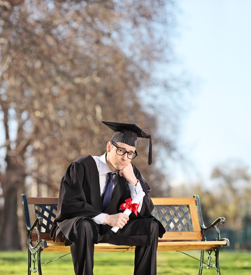 Depressed Graduate Student with a Diploma Sitting on the Floor Stock ...