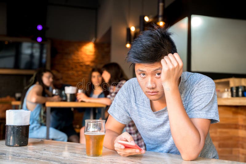 Sad Handsome Asian Man Alone in a Bar Stock Photo - Image of ...