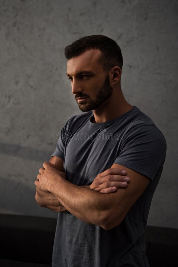 Sad handsome man standing stock photo. Image of sadness - 129096804