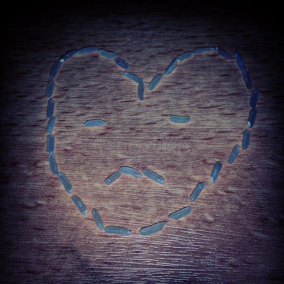 Sad heart of rice stock photo. Image of sadness, heart - 86719186