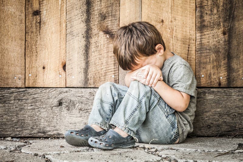 Sad Homeless Boy stock image. Image of human, beggar - 145573567