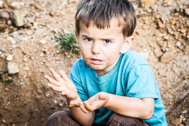 Sad Homeless Boy stock photo. Image of hungry, emotion - 145574446