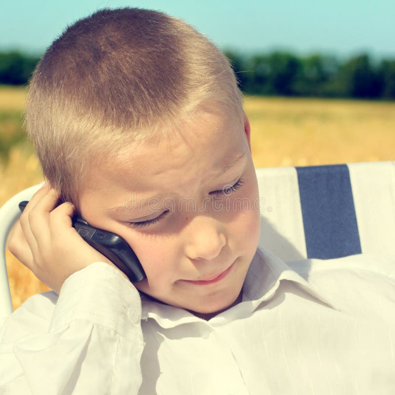 Sad Kid with Cellphone stock image. Image of nervous - 40602019