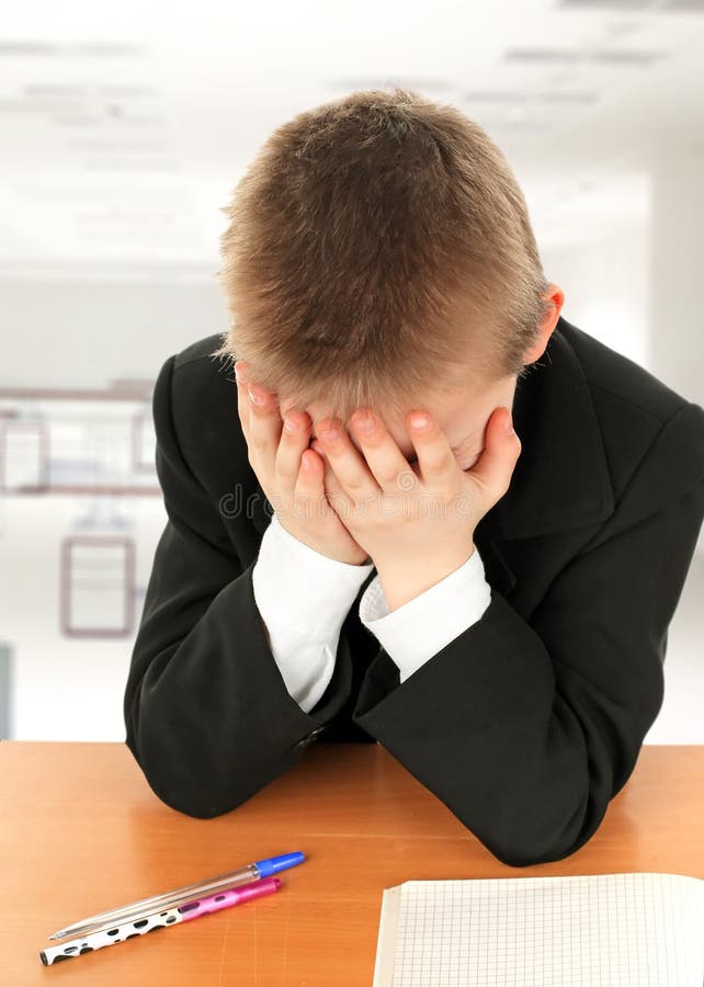 Sad Kid at the Desk stock photo. Image of indoor, caucasian - 38224456