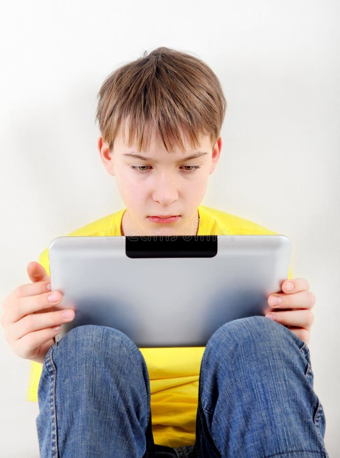 Sad Kid with Tablet Computer Stock Image - Image of caucasian, internet ...