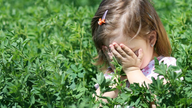 Sad Kid Crying in Tall Grass Stock Image - Image of bummed, downcast ...