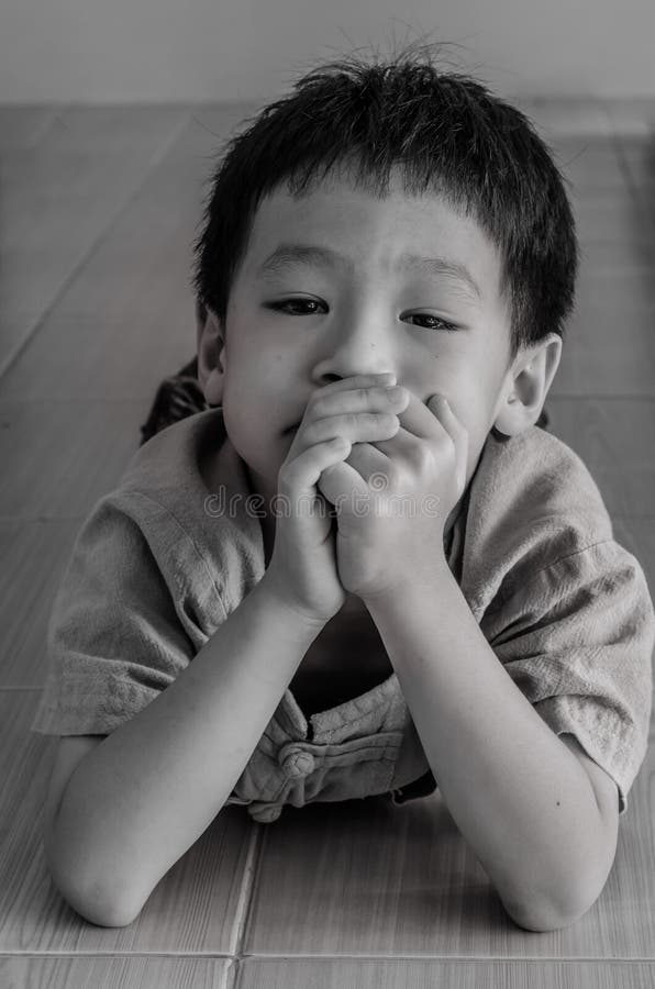 Sad little Asian boy stock photo. Image of defeat, black - 39049658