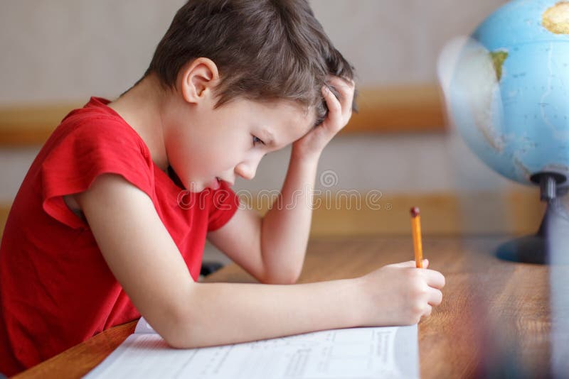 Sad Little Boy Depressed while Doing Homework Stock Photo - Image of ...