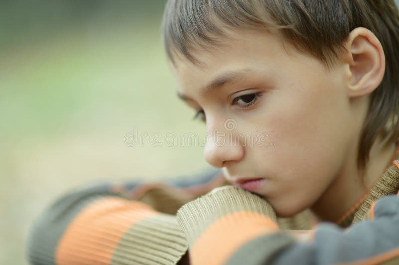 Tired or Distressed Little Boy, Face Down on Sofa Stock Photo - Image ...