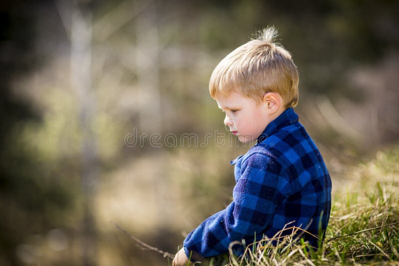 Sad little boy stock image. Image of tired, lonely, jacket - 69130049