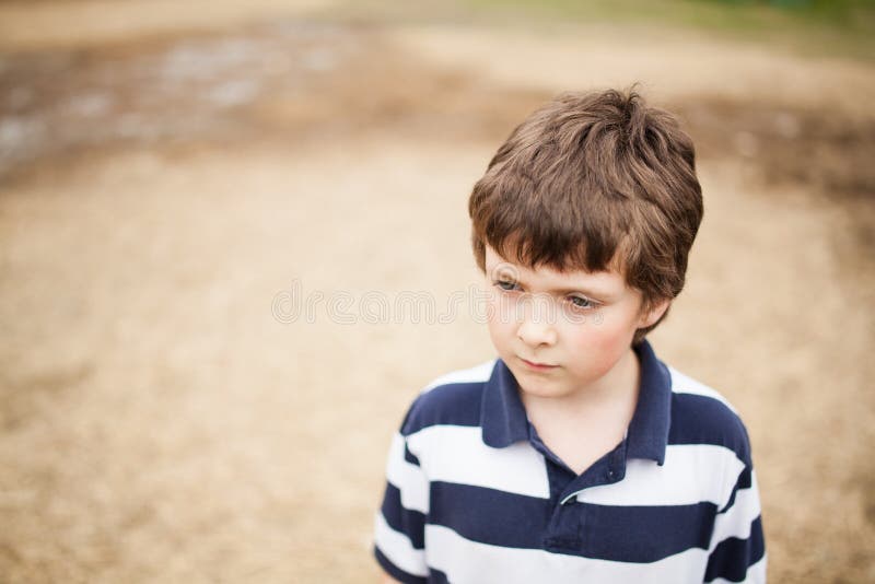 Sad little boy stock image. Image of expression, standing - 30563529