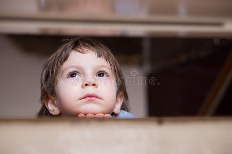 Sad Little Boy Thinking Looking Up Stock Photo - Image of worried ...