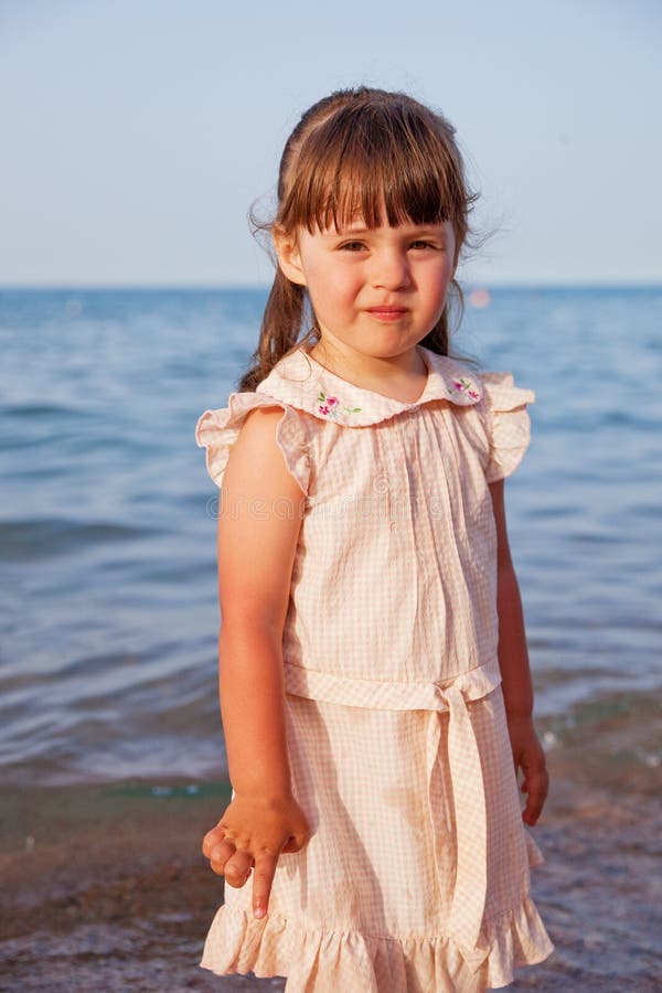 Sad little girl stock photo. Image of beach, ocean, emotional - 17886308