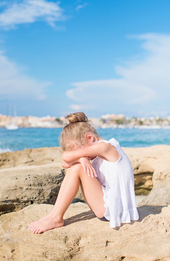 1,394 Sad Girl Sitting Beach Stock Photos - Free & Royalty-Free Stock ...