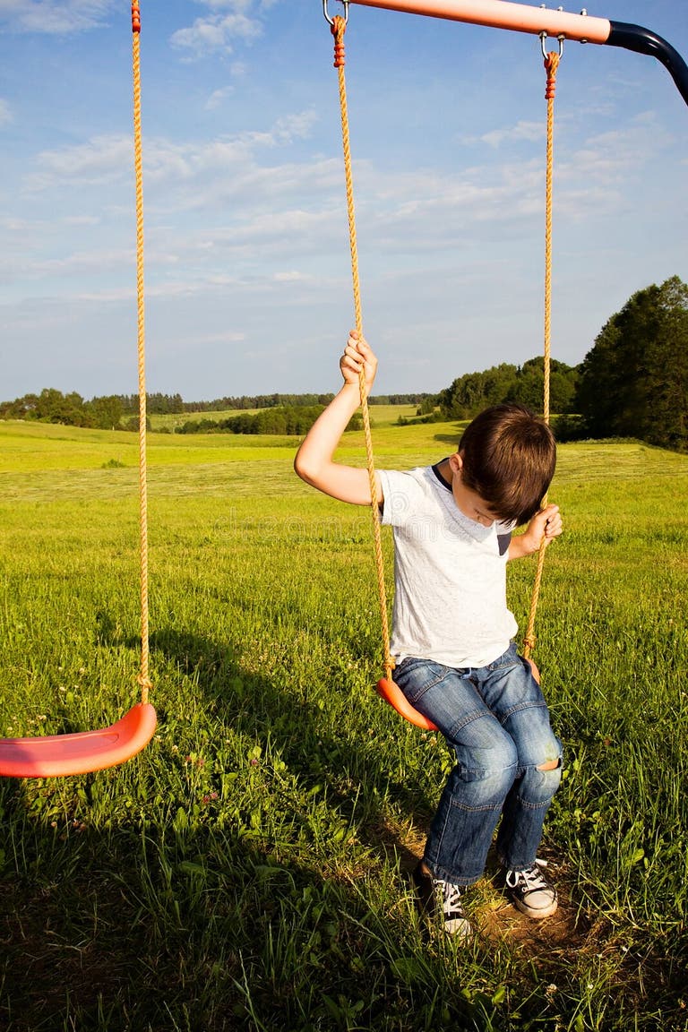 Sad Lonely Boy Sitting Swing Stock Photos - Free & Royalty-Free Stock ...