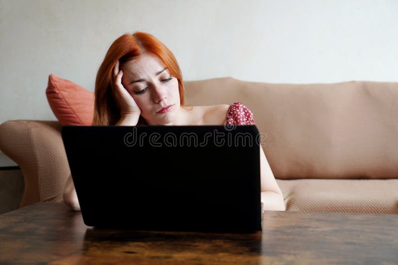 Sad Lonely Depressed Using Laptop Computer while Working from Home ...