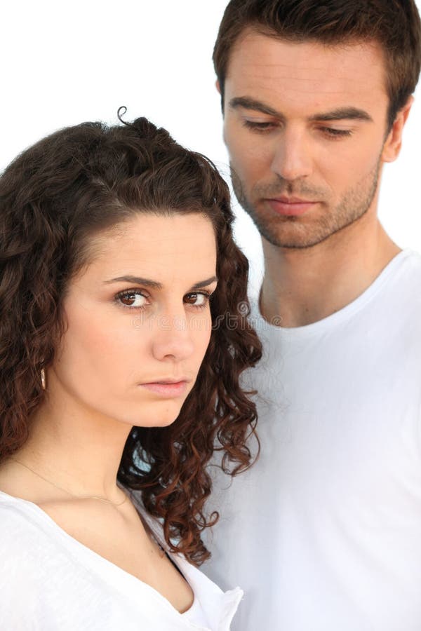 Side View of Sad Couple in Formal Wear Separated by Wall Stock Image ...