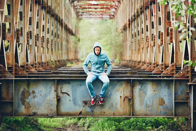 Sad Man on the Abandoned Bridge Stock Photo - Image of outdoor, people ...