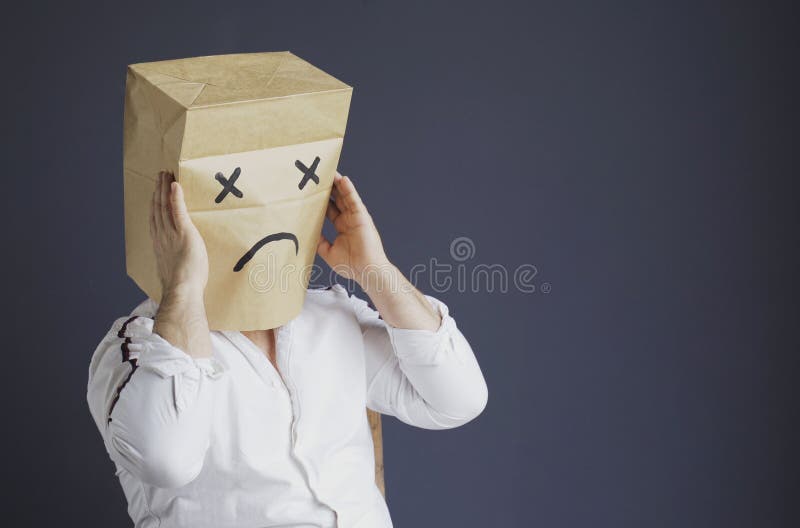 Sad Man with a Bag on His Head, with a Drawn Crying Emoticon Stock ...