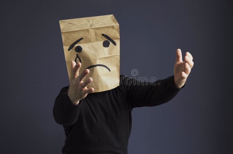 Sad Man with a Bag on His Head, with a Drawn Crying Emoticon. Stock ...