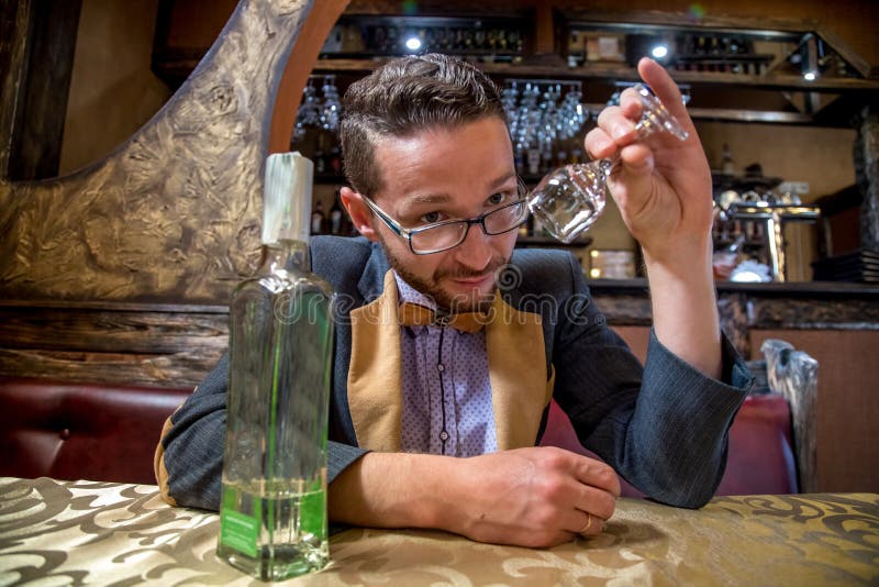 Sad man in a bar stock image. Image of dinner, classic - 93767417