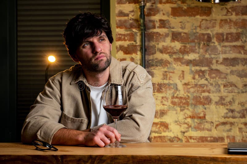 Sad Man Complains and Drinks Wine Alone at Home. Drunk Man Drinks a ...