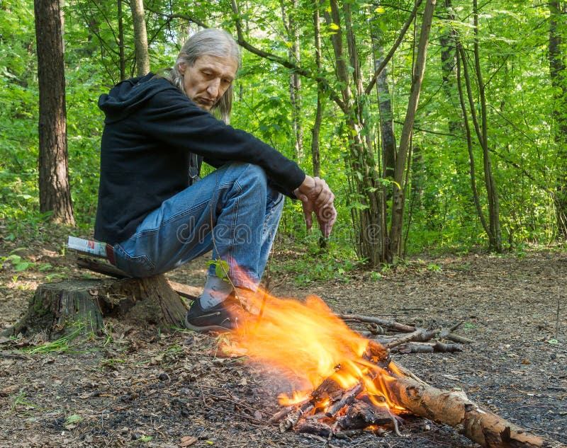 Sad man at a fire stock image. Image of meaninglessness - 40883699