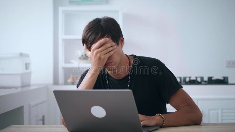 Sad Man Freelancer Looking Stressed Out while Working on Laptop Worried ...