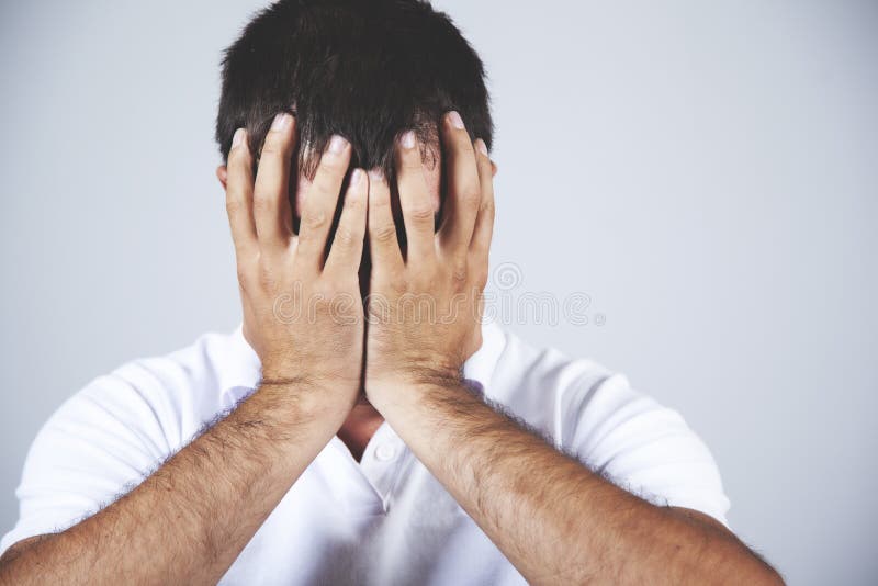 Sad man hand in face stock image. Image of male, face - 152955885