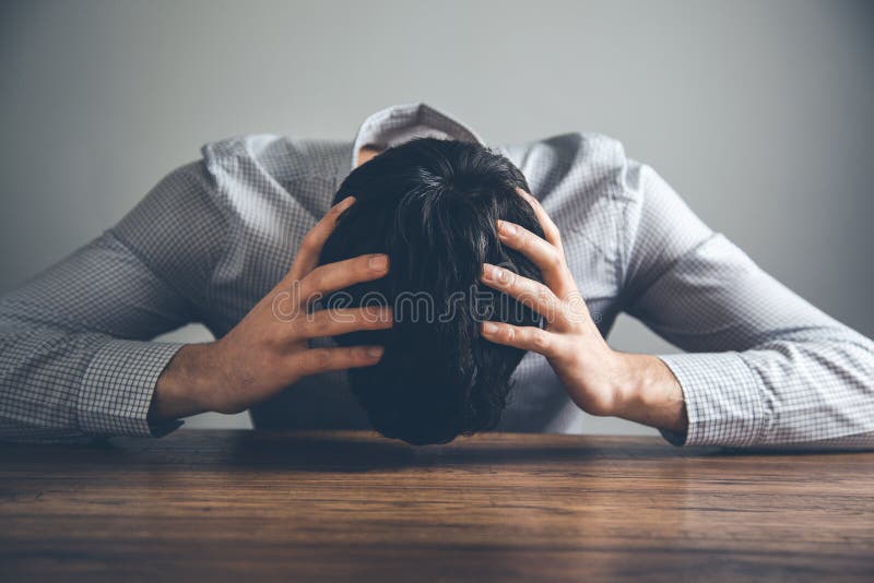 Sad Man Hand in Head on Desk Stock Photo - Image of tired, problem ...