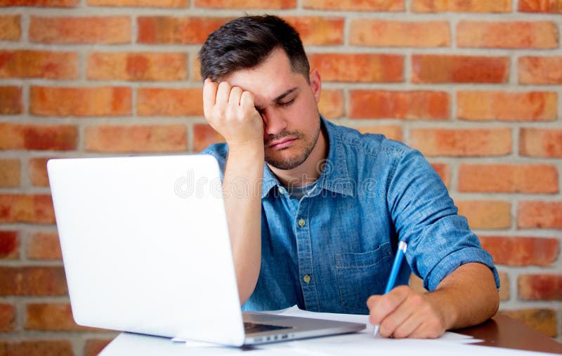 Sad Man with Laptop Computer Stock Photo - Image of pretty, looking ...