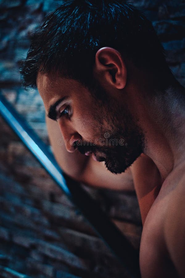 Sad man looking down stock photo. Image of attractive - 74004954