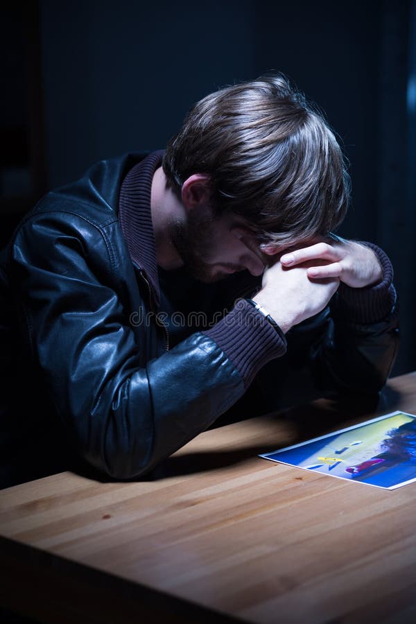 Sad man looking at picture stock image. Image of alone - 55449555