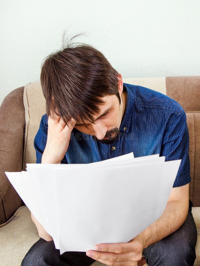 Sad Man with a Papers stock image. Image of sadness - 134519287